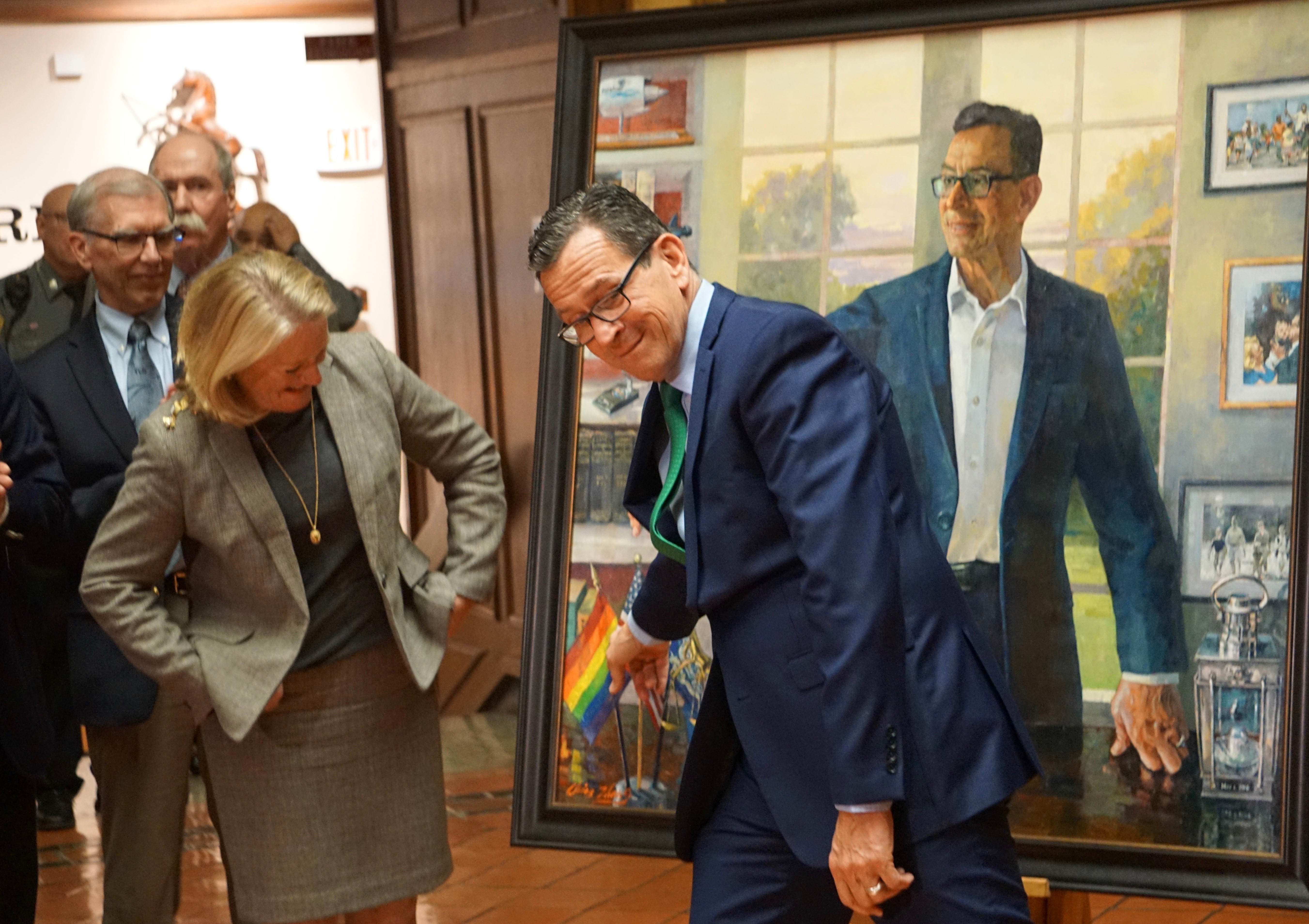 An early unveiling of Malloy's official portrait